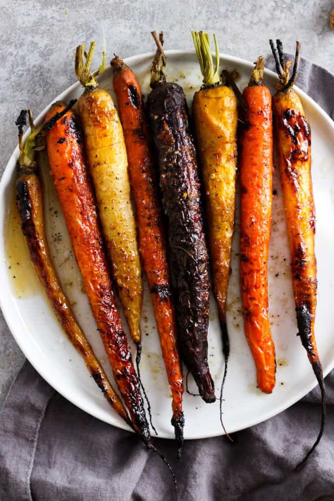 Easy Roasted Rainbow Carrots with Maple Glaze - Grateful Grazer