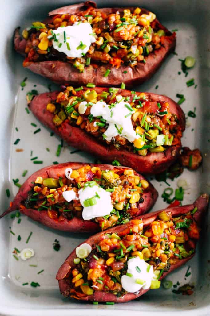 Vegetarian Loaded Sweet Potatoes with BBQ Tempeh - Grateful Grazer